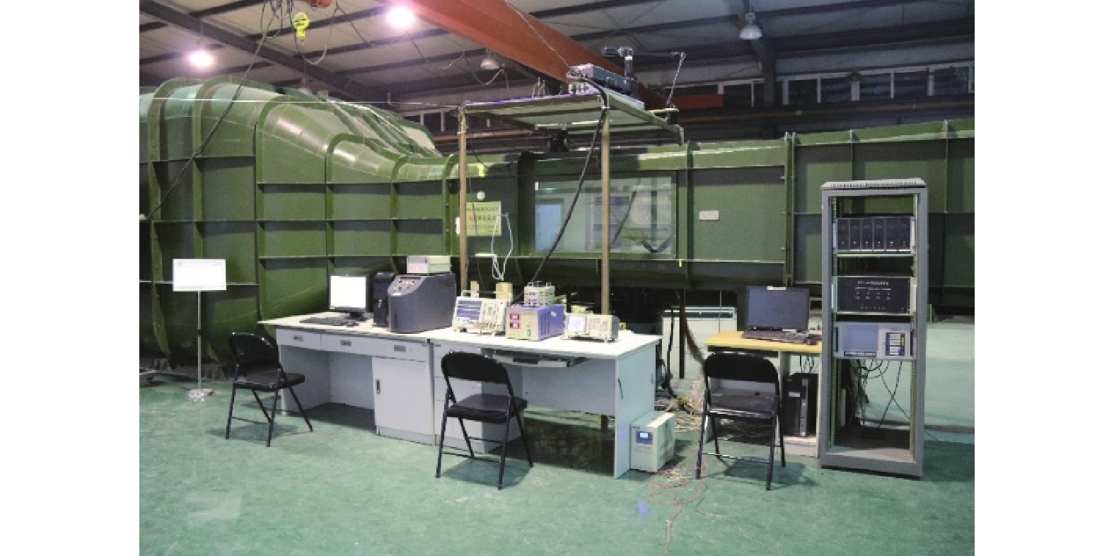 滑动放电等离子体控制细长体头部背风区非对称涡实验研究